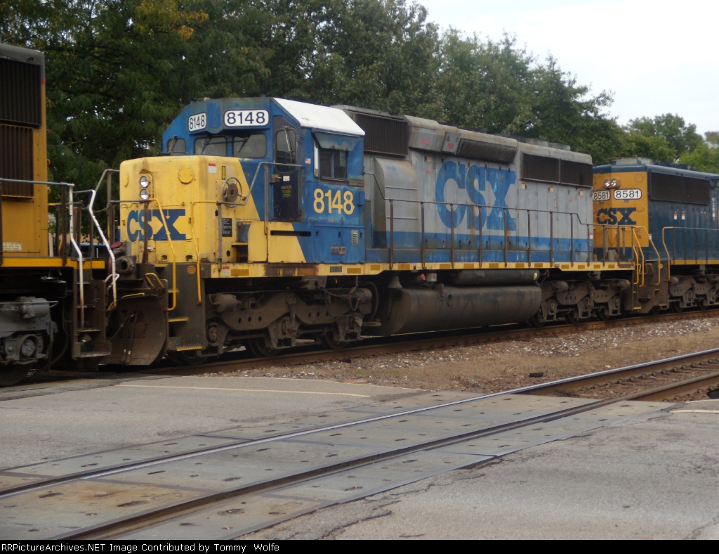 CSX 8148 is the 2nd unit on MASKC as it heads west in its YN2 paint scheme